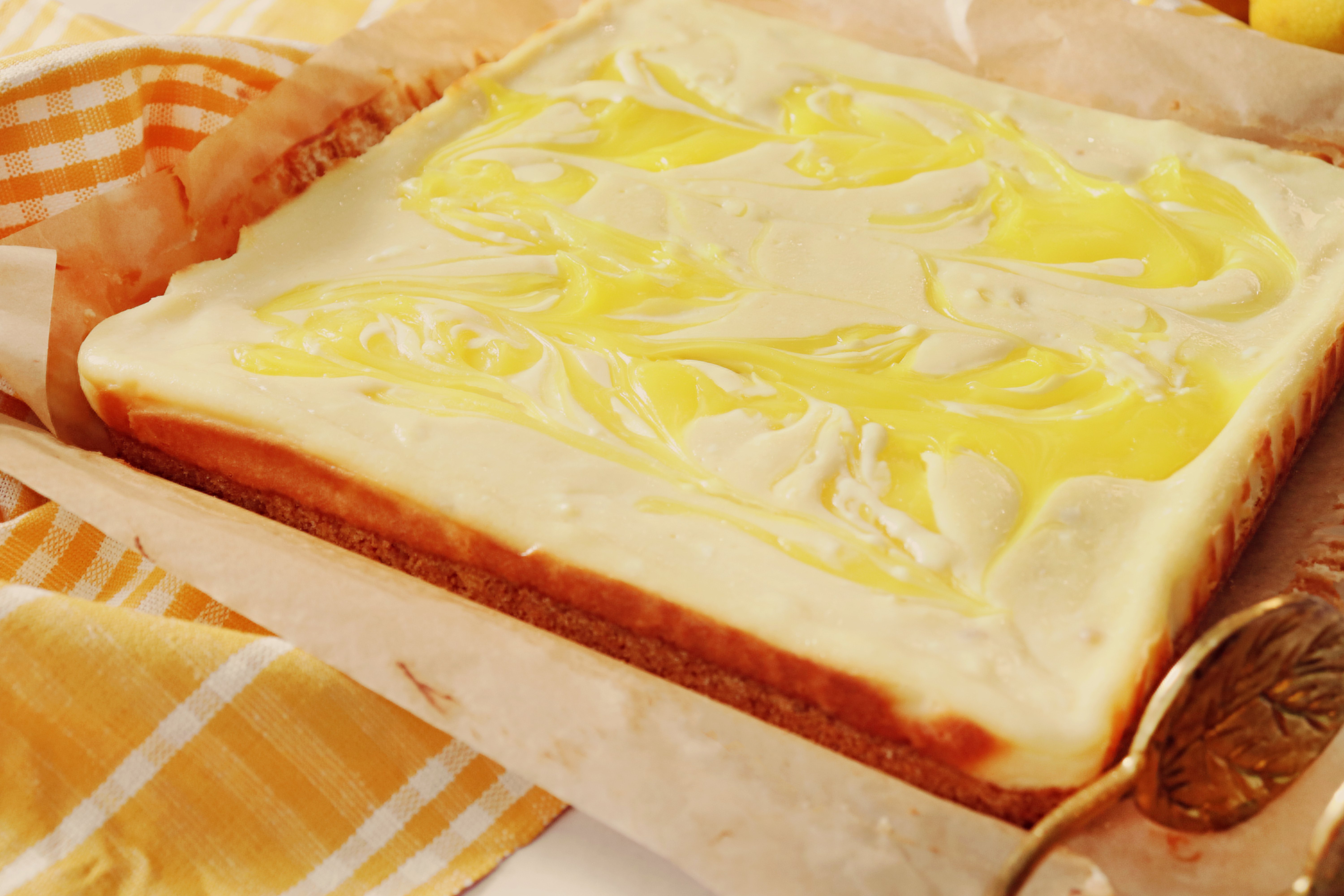 Lemon Swirl Cheesecake Bars: a Citrusy Twist on a Classic - Krystel's ...